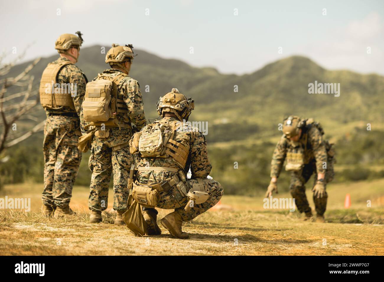 U.S. Marine Corps Staff Sgt. Sung Shin, right, a fires and effects ...