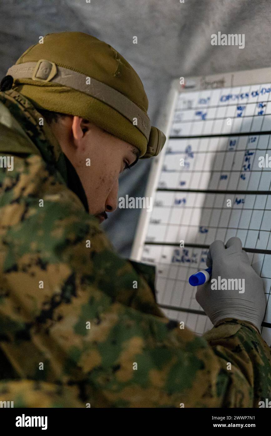 U.S. Navy Hospital Corpsman Philips Elisha with Combat Logistics ...