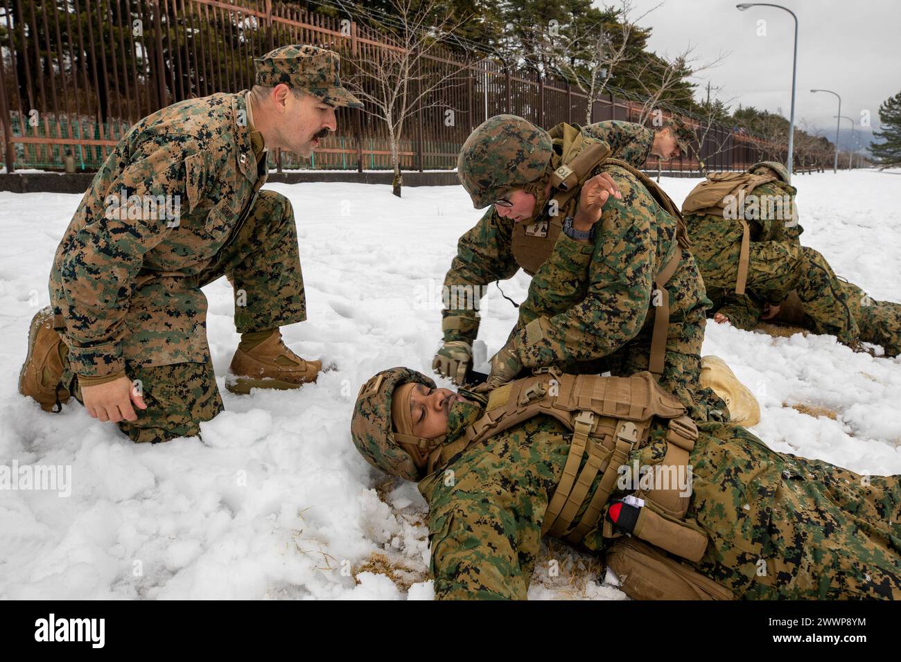 U.S. Marine Corps Cpl. Keaton Carlson, right, a transmissions system operator with Combat ...