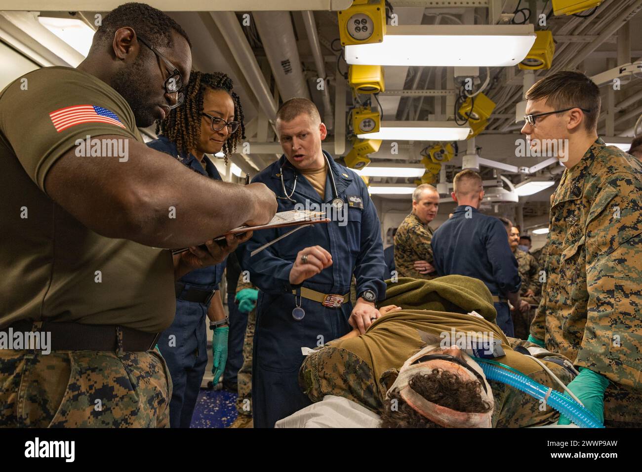 U.S. Navy medical personnel with the amphibious assault ship USS ...