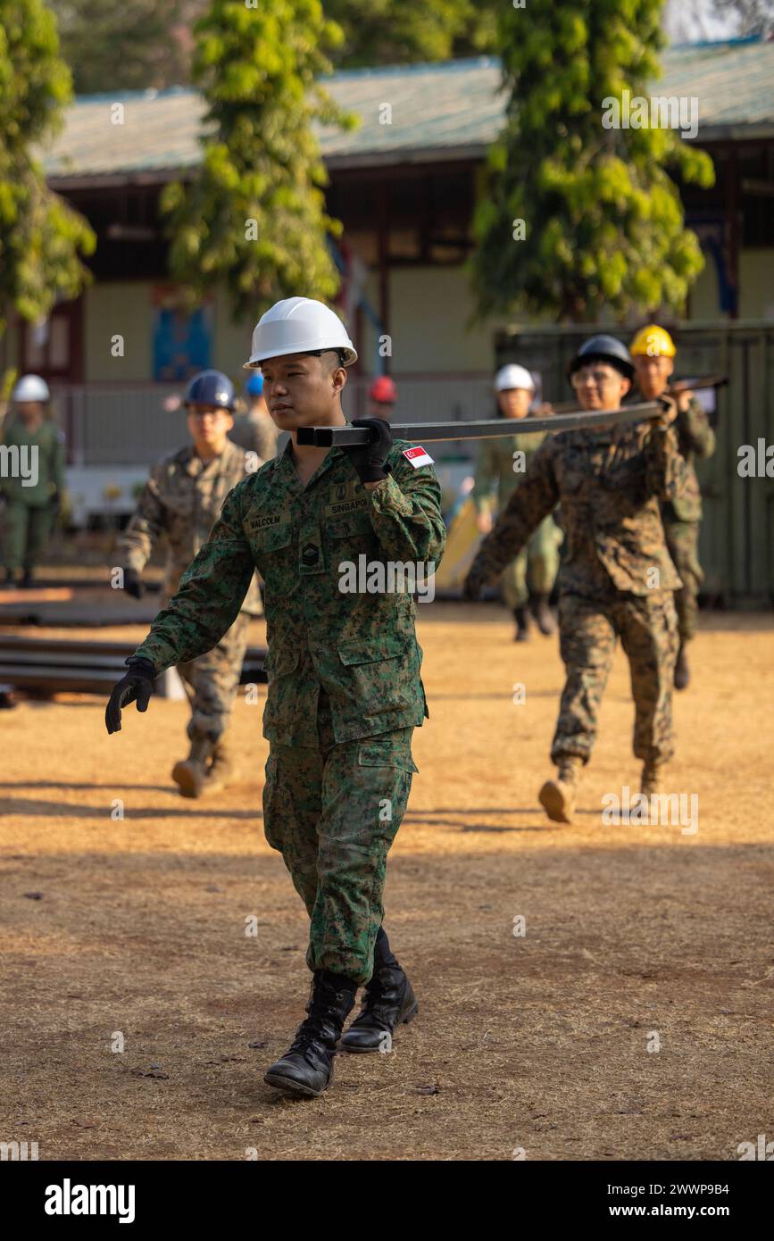 A member of the Singapore Army’s 30th Combat Engineer Battalion carries ...
