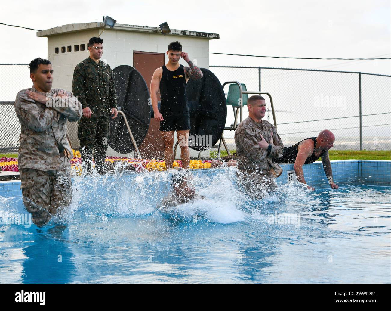 U.S. Marine Corps Forces, Pacific (MARFORPAC), Marines jump into a pool ...