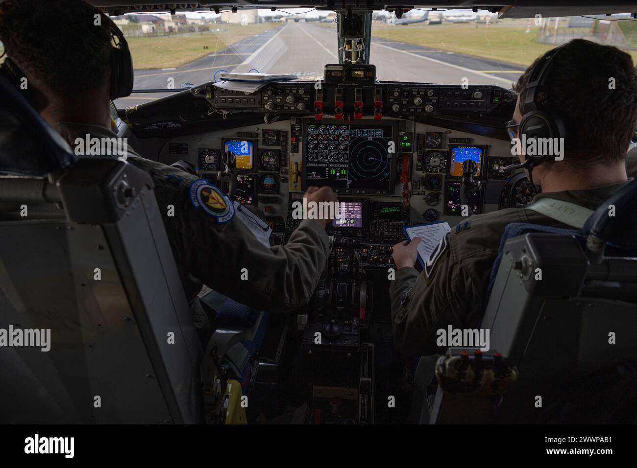 U.S. Airmen assigned to the 100th Air Refueling Wing taxi down the ...
