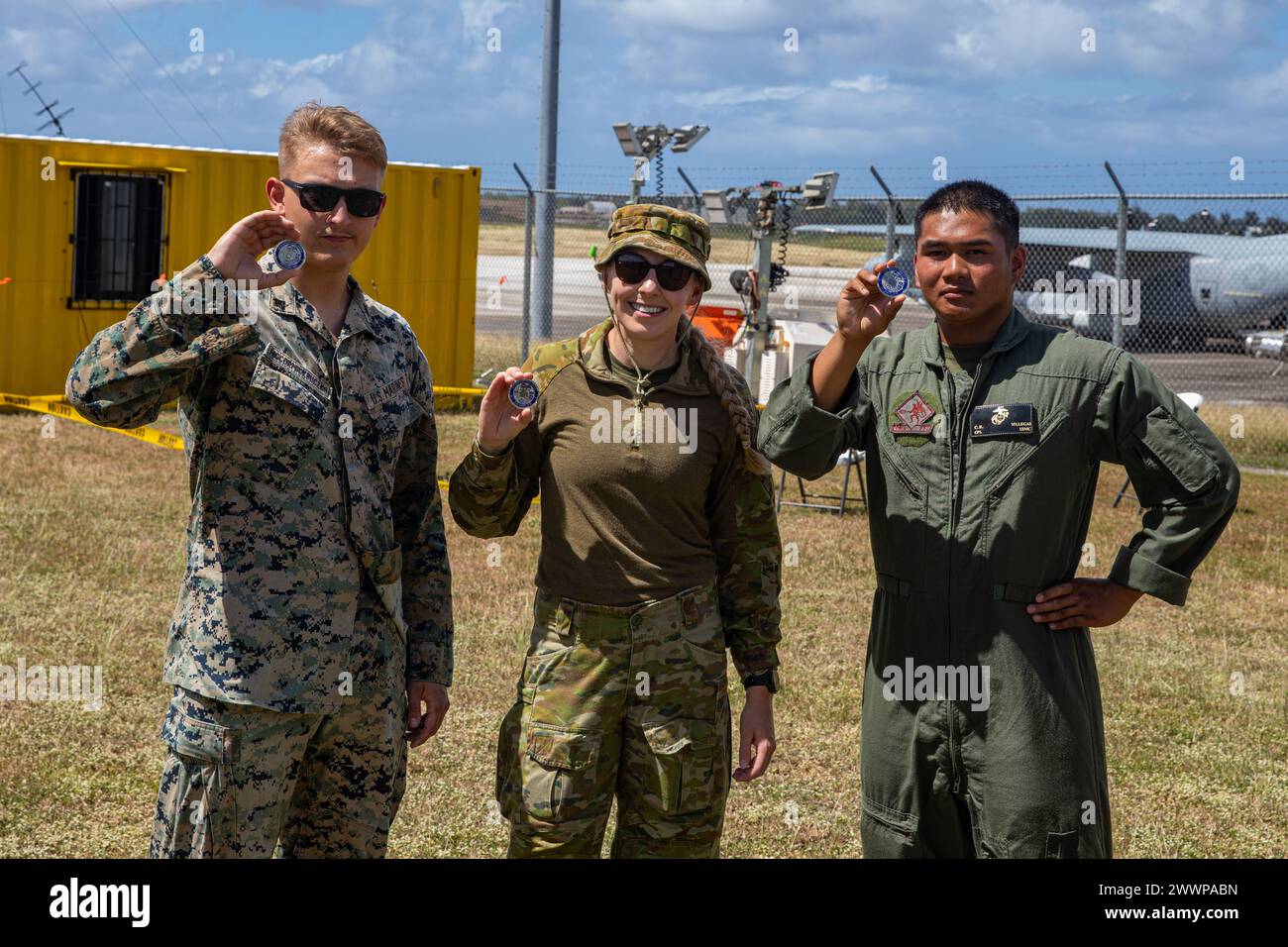 U.S. Marine Corps Cpl. Connor McCormickBuczko, left, a radio operator ...