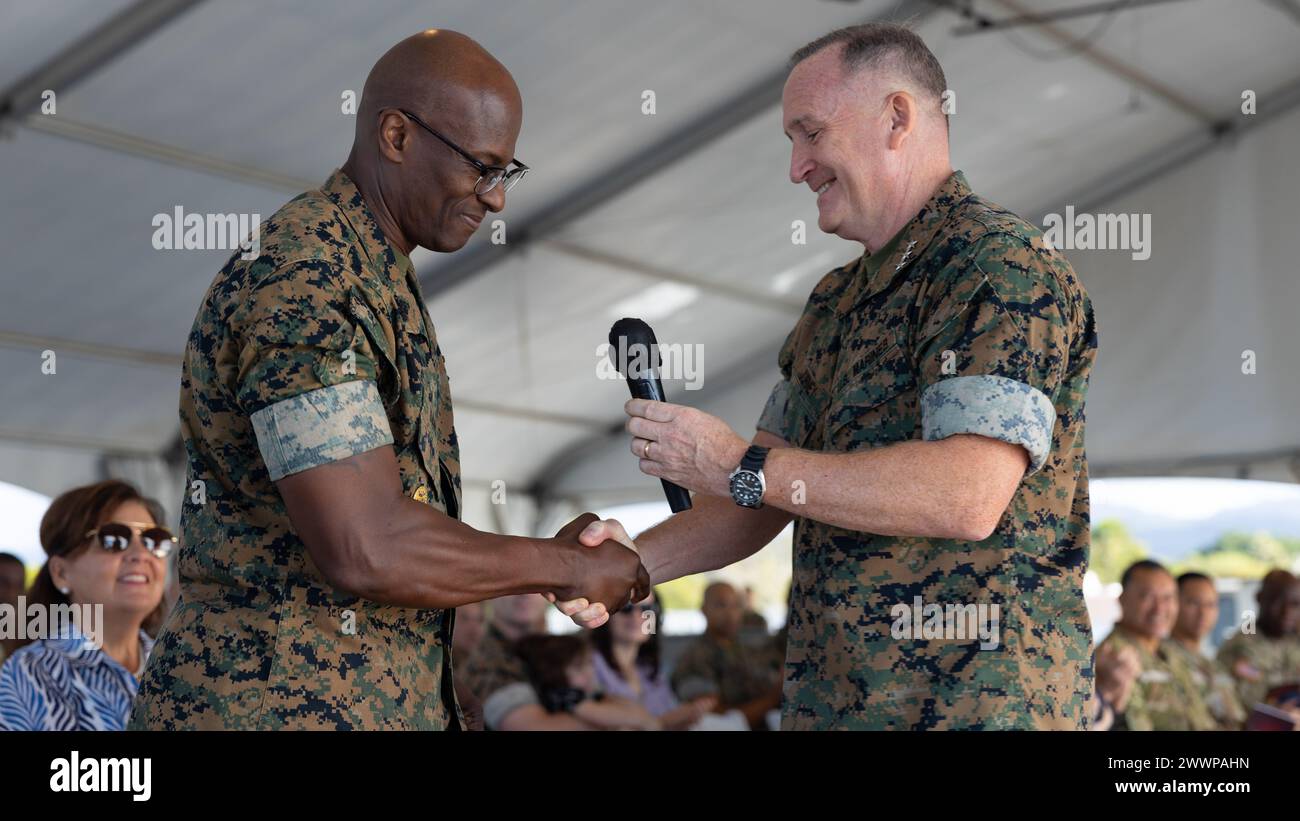 U.S. Navy Master Chief Petty Officer Donald J. Davis, Jr., left, off ...