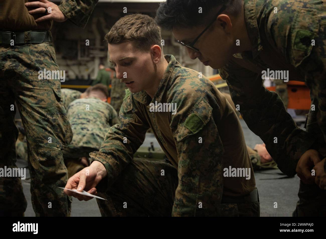 U.S. Marine Corps Lance Cpl. Andrew J. Petok left, and Staff Sergeant ...