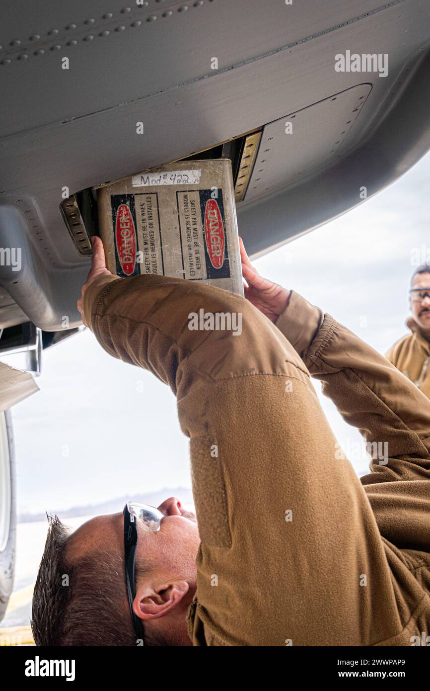 U.S. Airmen Master Sgt. Ryan Hubbard, an aircraft mechanic assigned to ...
