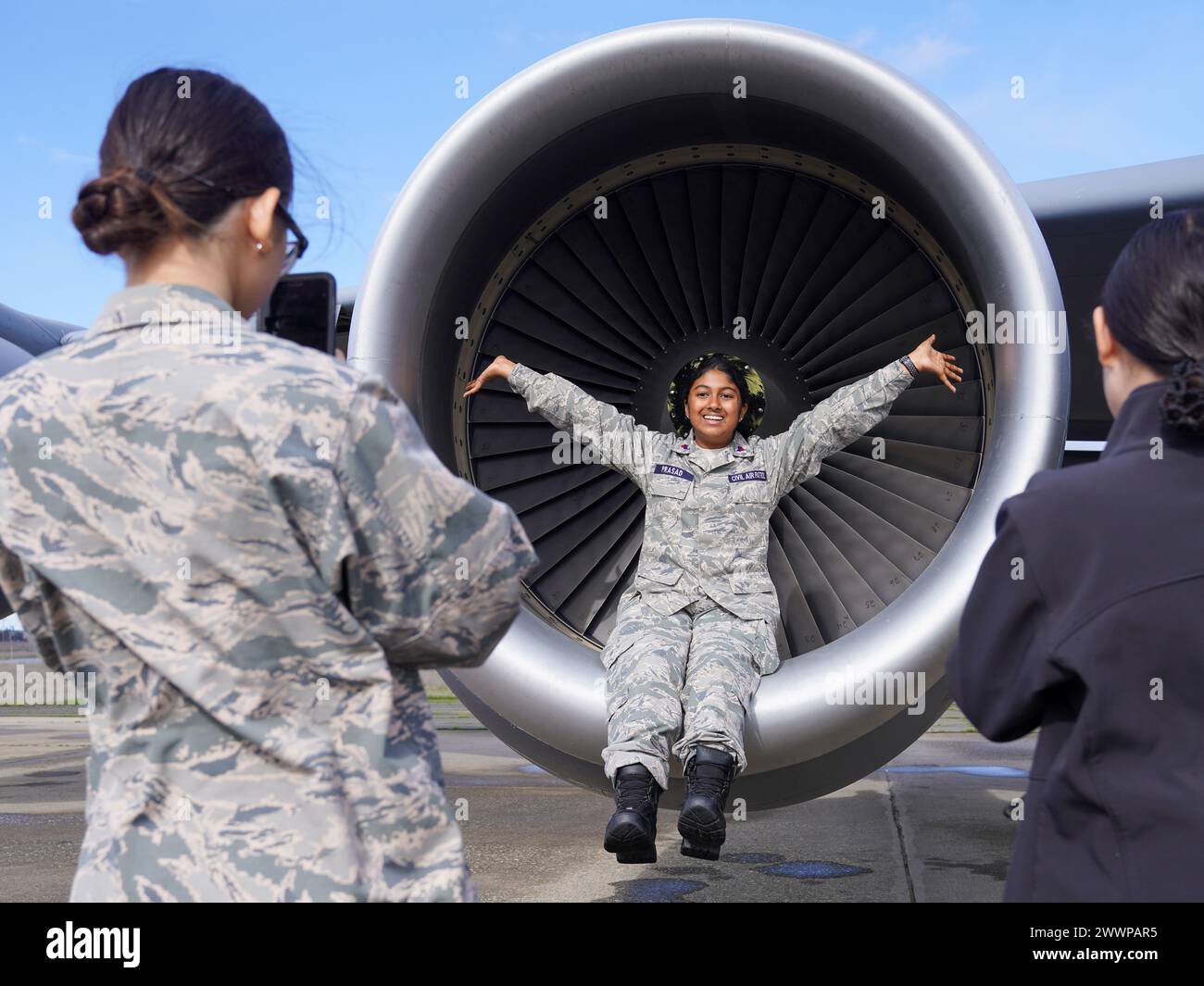 Prartana, a California Civil Air Patrol cadet is photographed with a KC ...