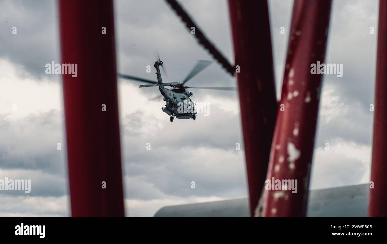 An MH-60R Seahawk helicopter attached to Helicopter Maritime Strike ...