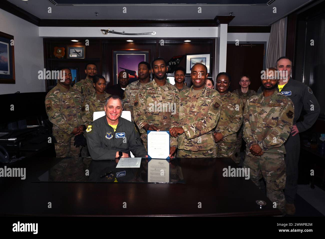 U.S. Air Force Col. Keith Butler, 509th Bomb Wing commander and members ...