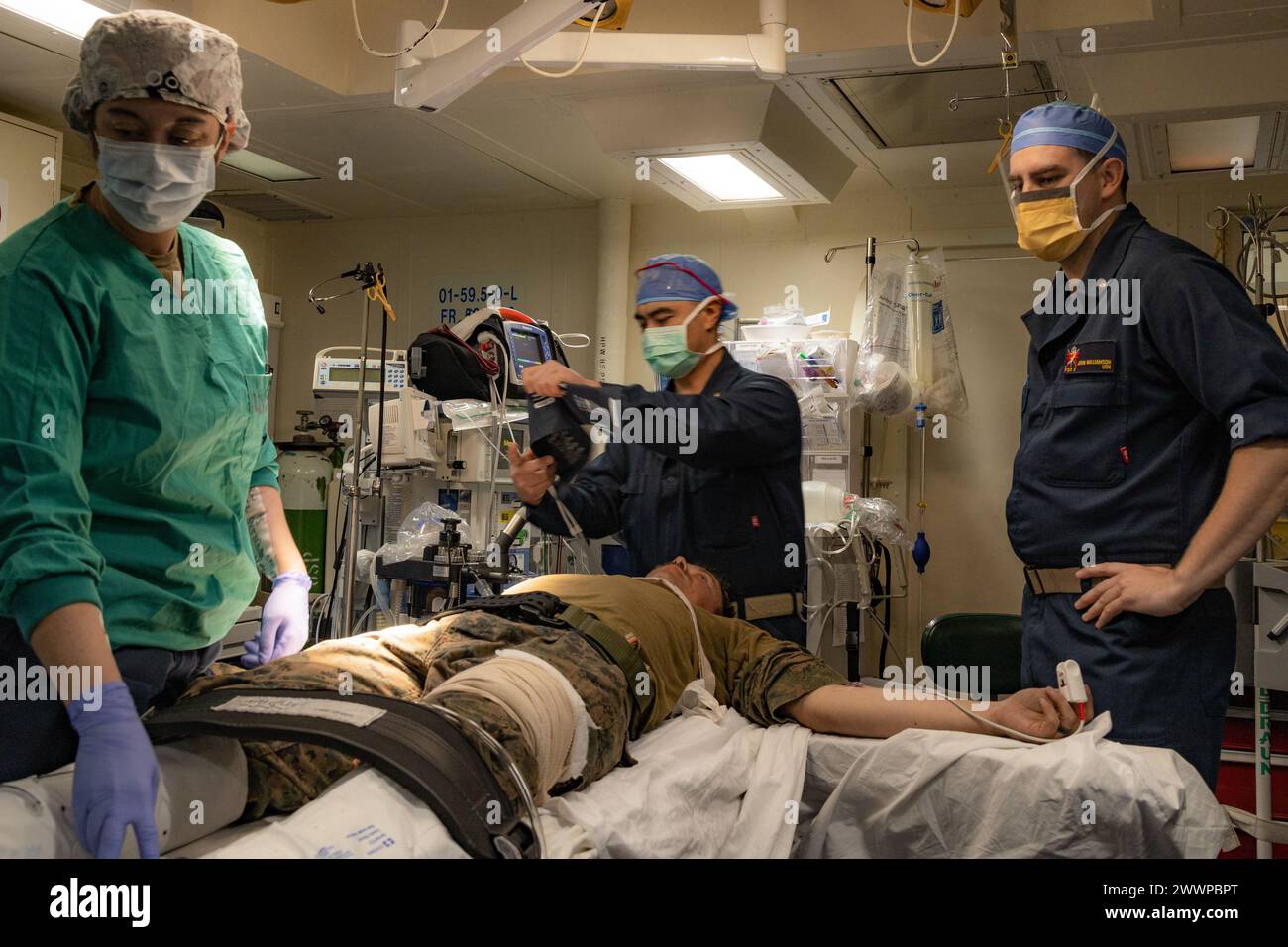 U.S. Navy medical personnel with the amphibious assault ship USS ...