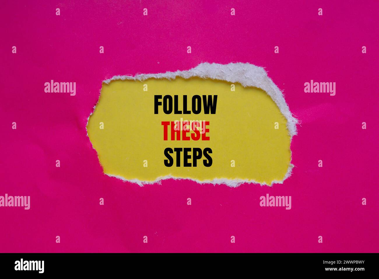 Follow these steps words written on pink torn paper with yellow ...