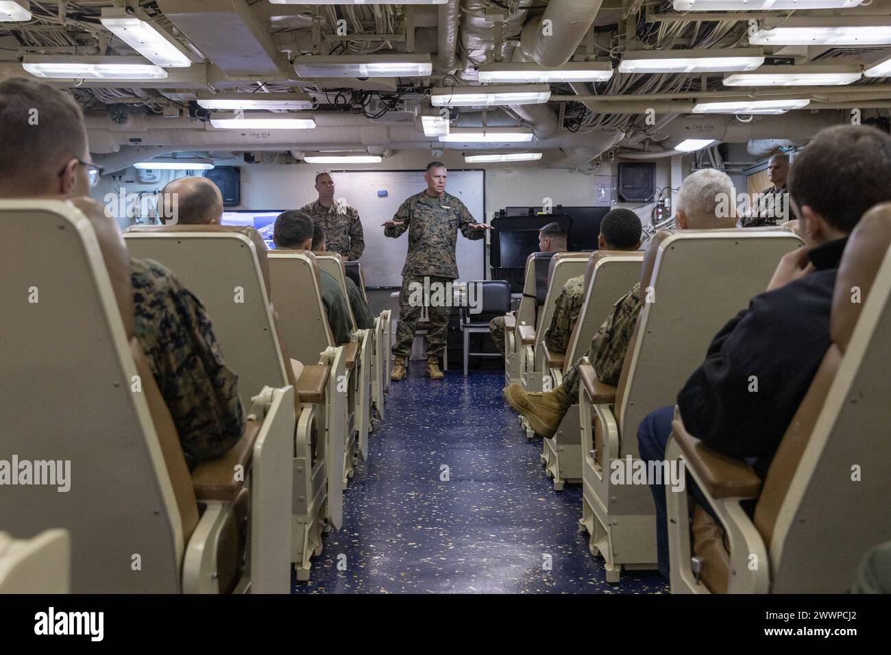 U.S. Marine Corps Maj. Gen. Eric Austin, center, the commanding general ...