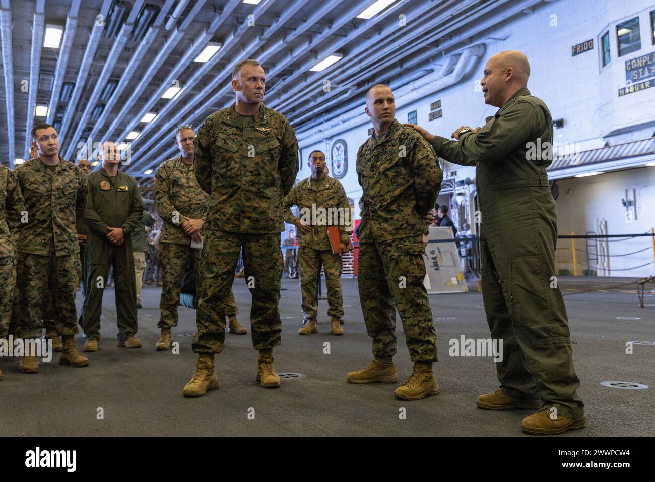 U.S. Marine Corps Master Sgt. David Camacho Jr., right, a maintenance ...