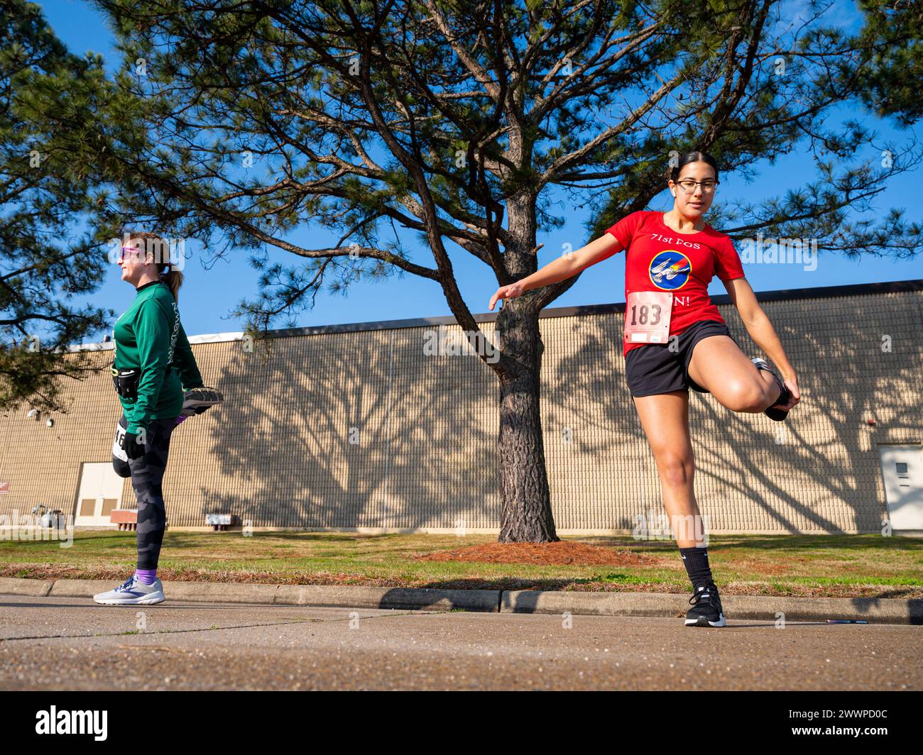 Kyra Russell, race participant, left, and Airman 1st Class Nabila, 71st ...