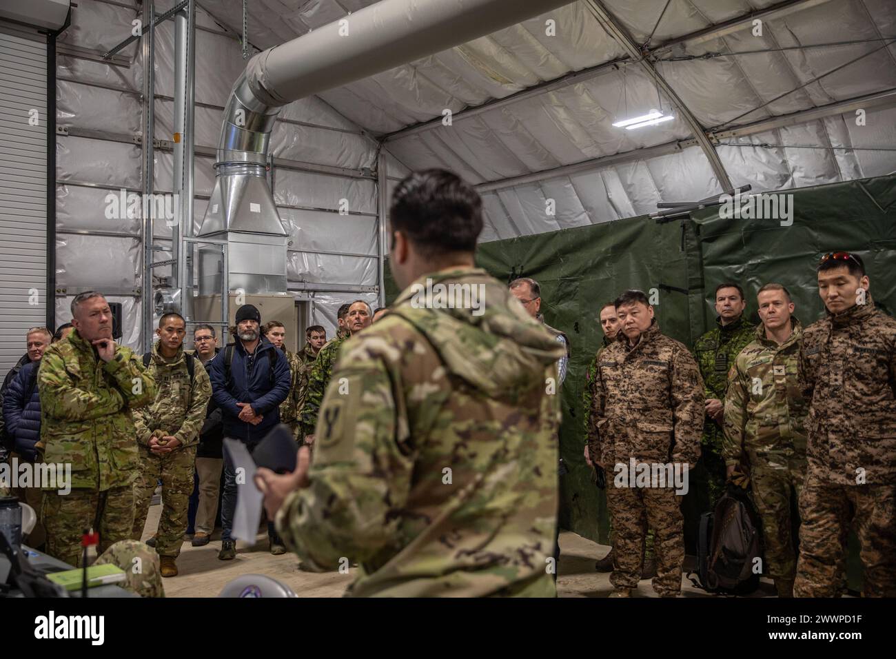 Distinguished visitors pay a visit to the 11th Airborne Division as part of Joint Pacific ...