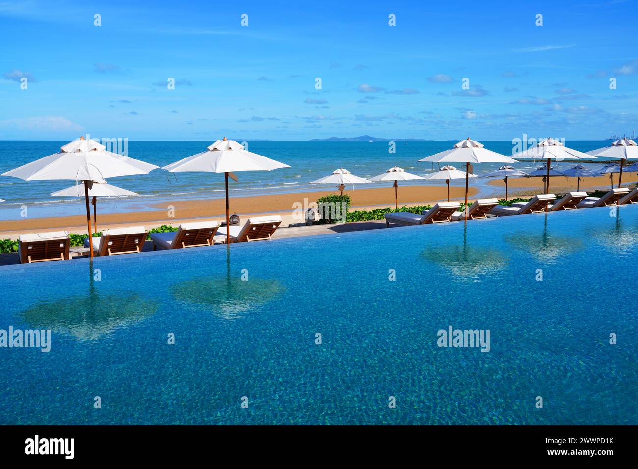 JOMTIEN BEACH, THAILAND -12 JUL 2023- View of the infinity pool with ...