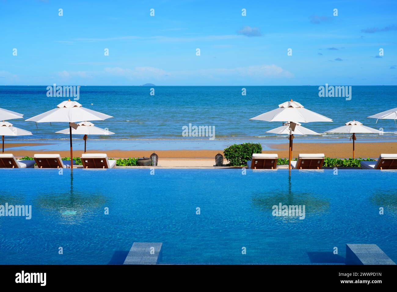 JOMTIEN BEACH, THAILAND -12 JUL 2023- View of the infinity pool with ...