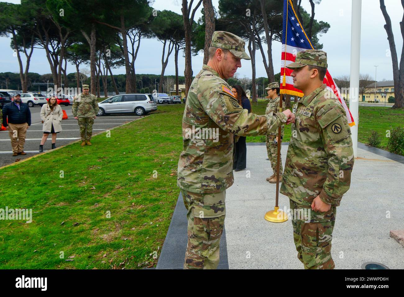 Left, U.S. Army Lt. Col. Michael S. Harrell commander of 839th Transportation Battalion applies ...