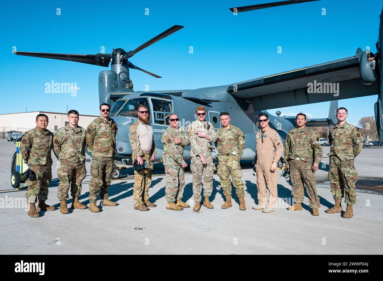 Chief Master Sgt. Justin Apticar (center left), 19th Air Force command ...