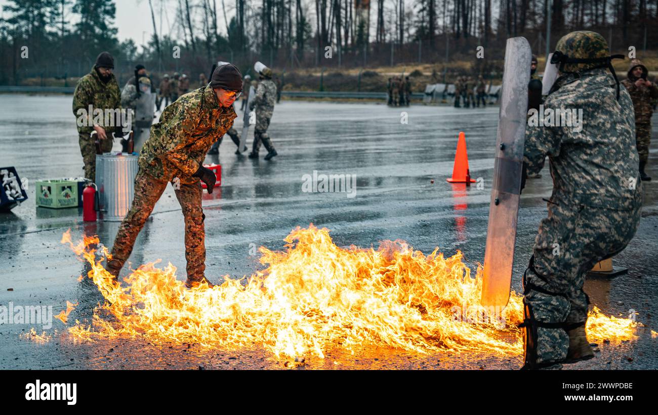 A Portuguese soldier assigned to the 2nd Lancers Regiment provides ...