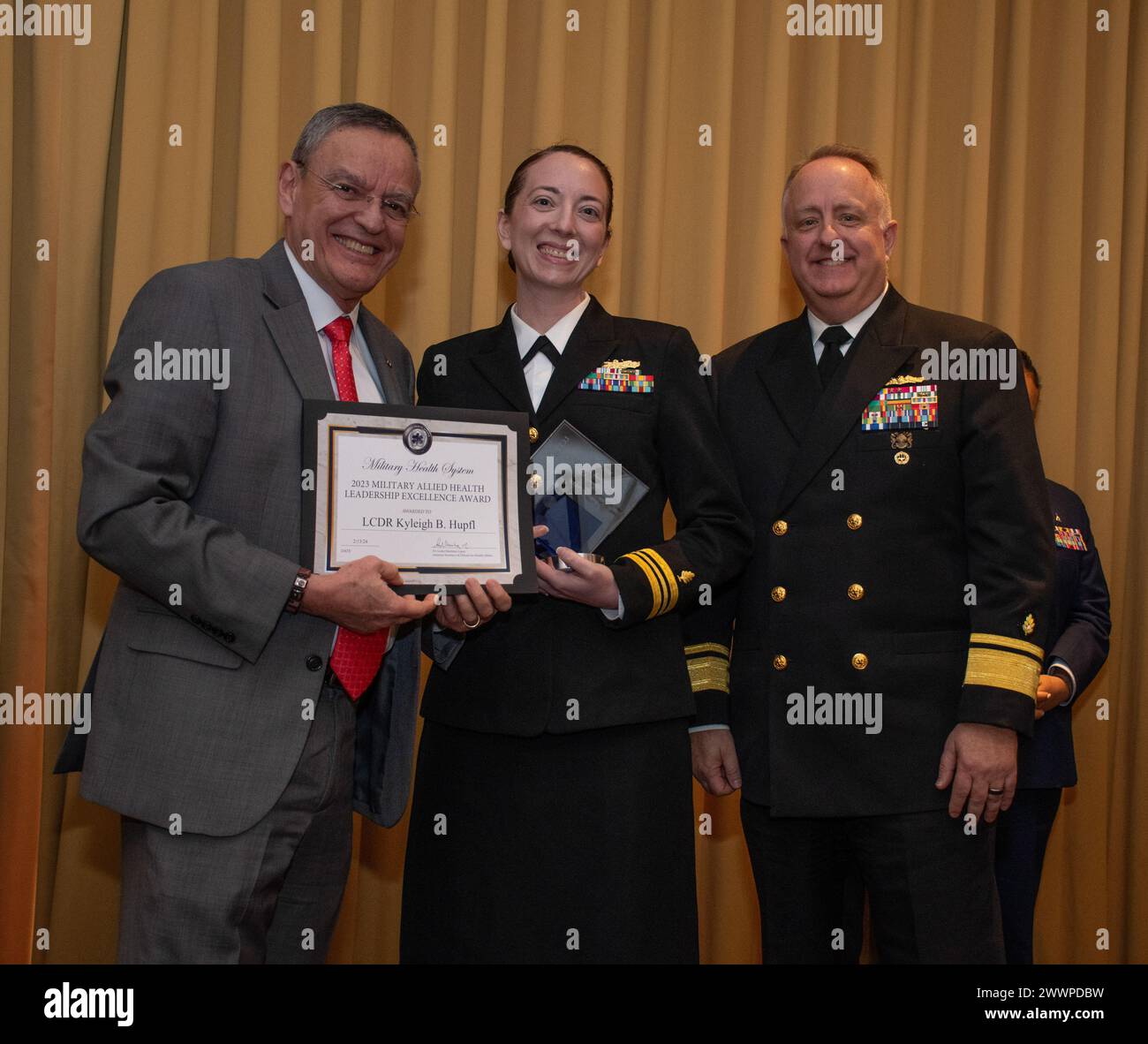 U.S. Navy Lt. Cmdr. Kyleigh Hupfl was presented with the Military ...