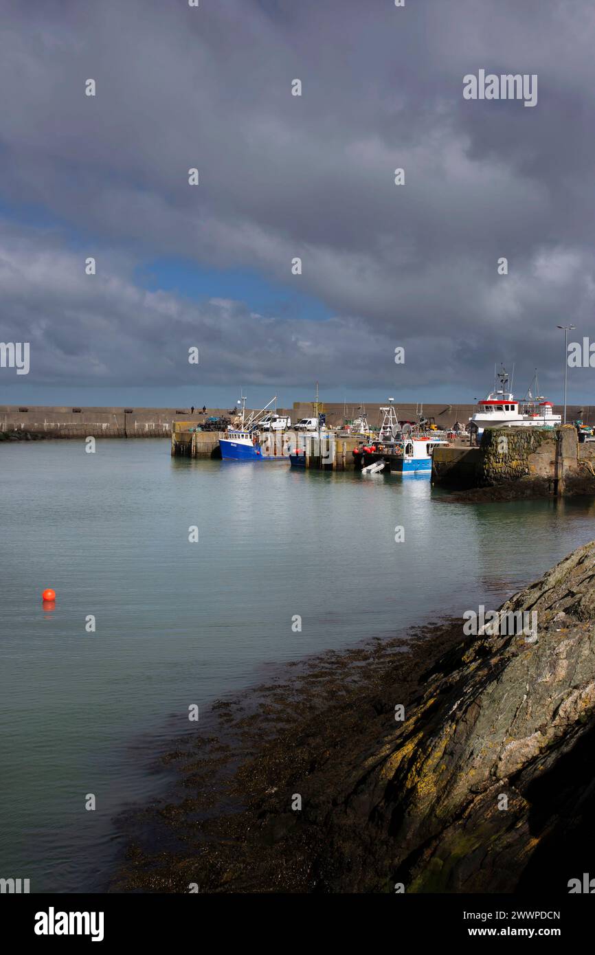 Amlwch Harbour with fishing boats vessels moored. Amlwch Port, Anglesey ...