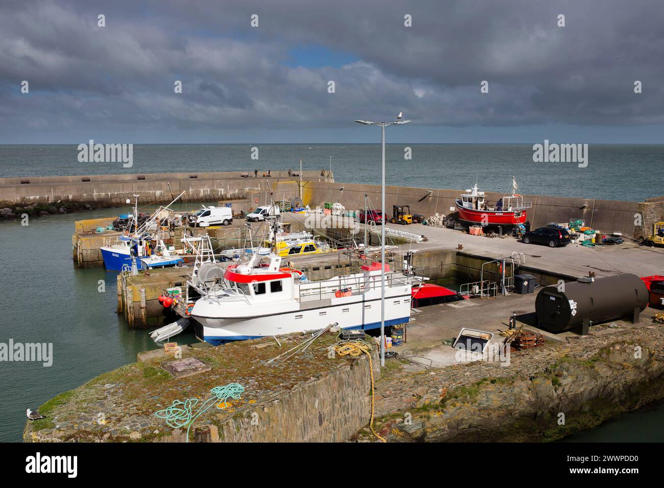 Amlwch Harbour with fishing boats vessels moored. Amlwch Port, Anglesey ...
