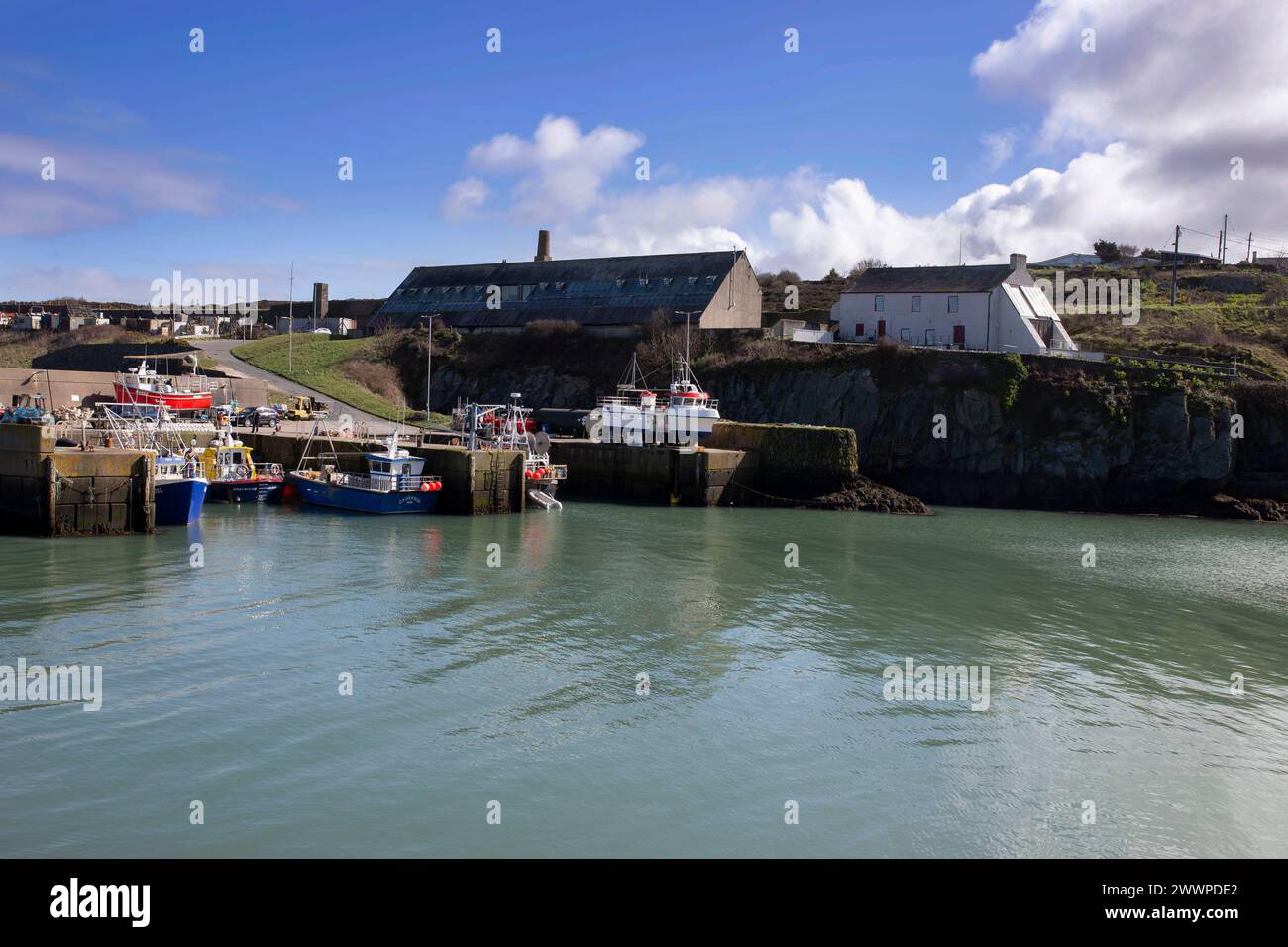Amlwch Harbour with fishing boats vessels moored. Amlwch Port, Anglesey ...