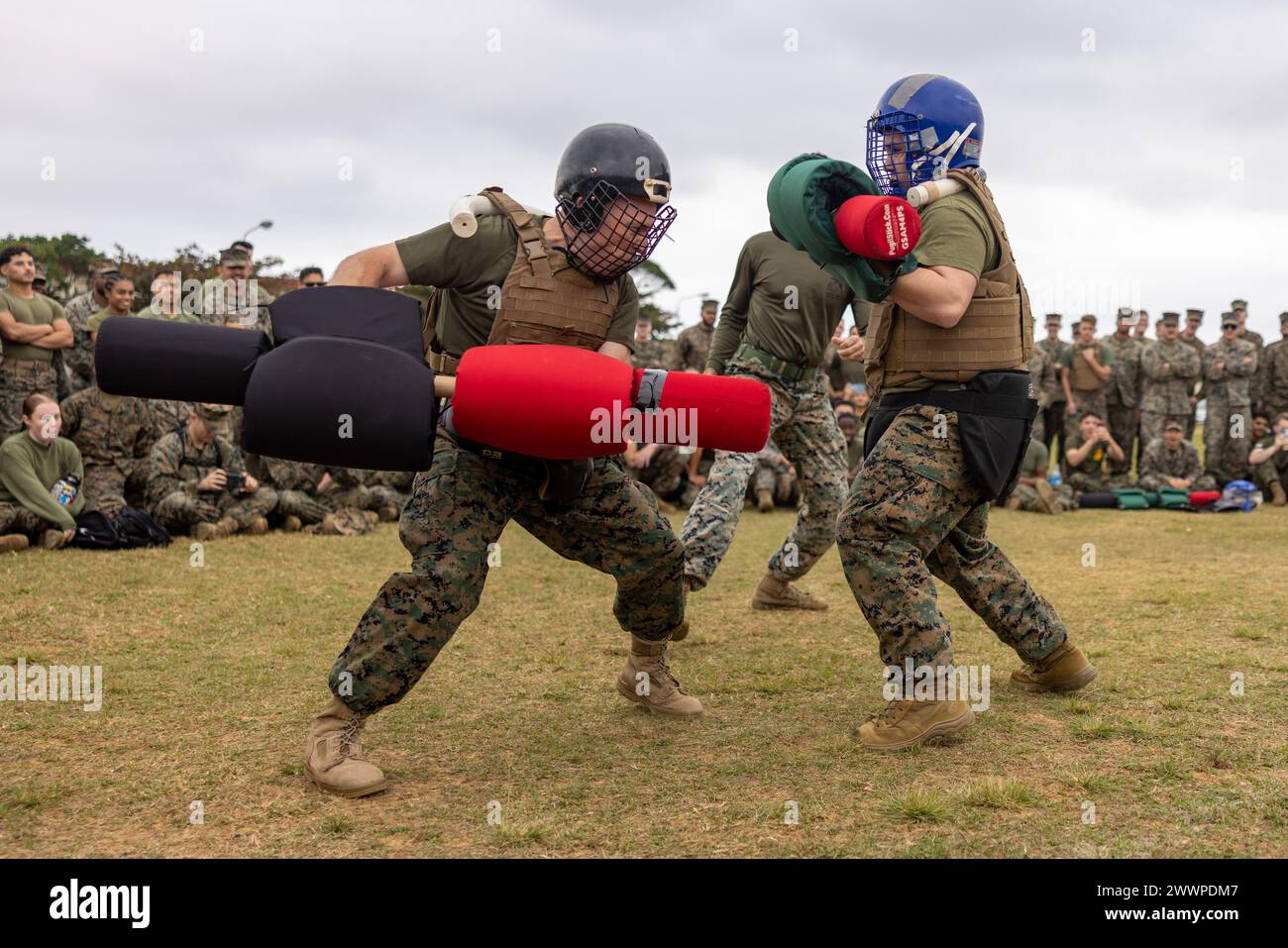 U.S. Marines with Marine Air Control Group (MACG) 18, participate in pugil stick match during a ...