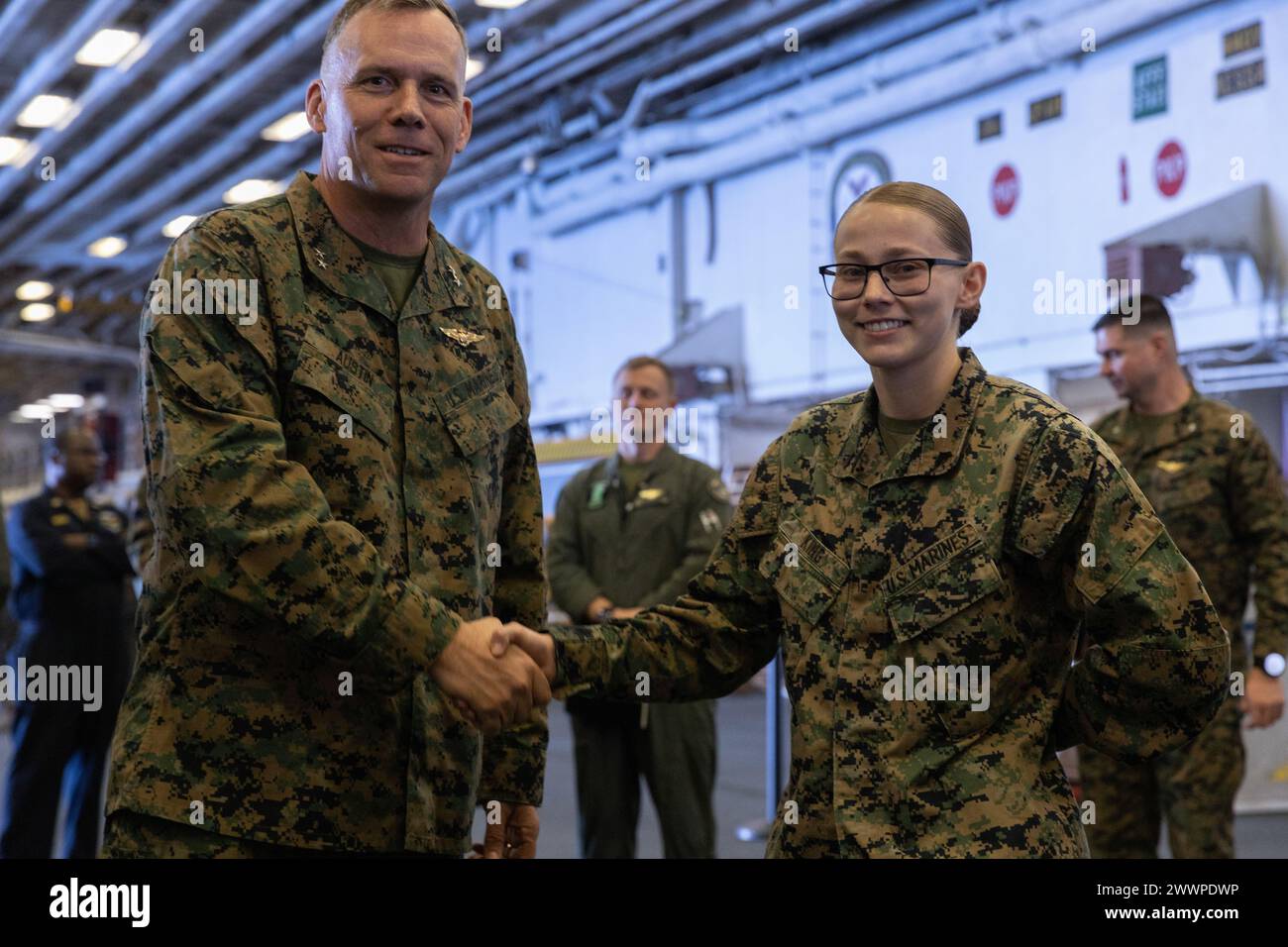 U.S. Marine Corps Maj. Gen. Eric Austin, left, the commanding general ...