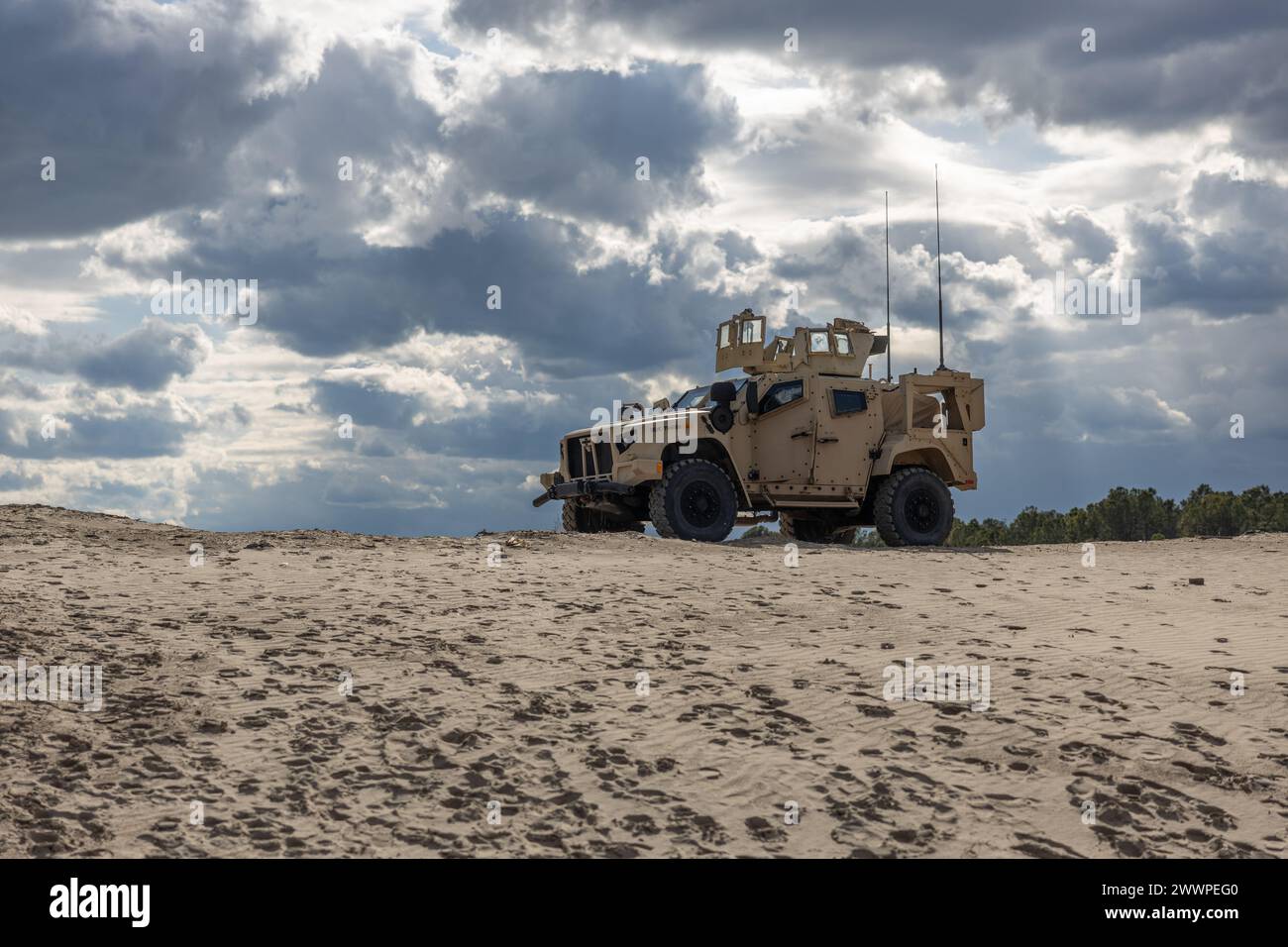 A U.S. Marine Corps Joint Light Tactical Vehicle sits on a hill during ...