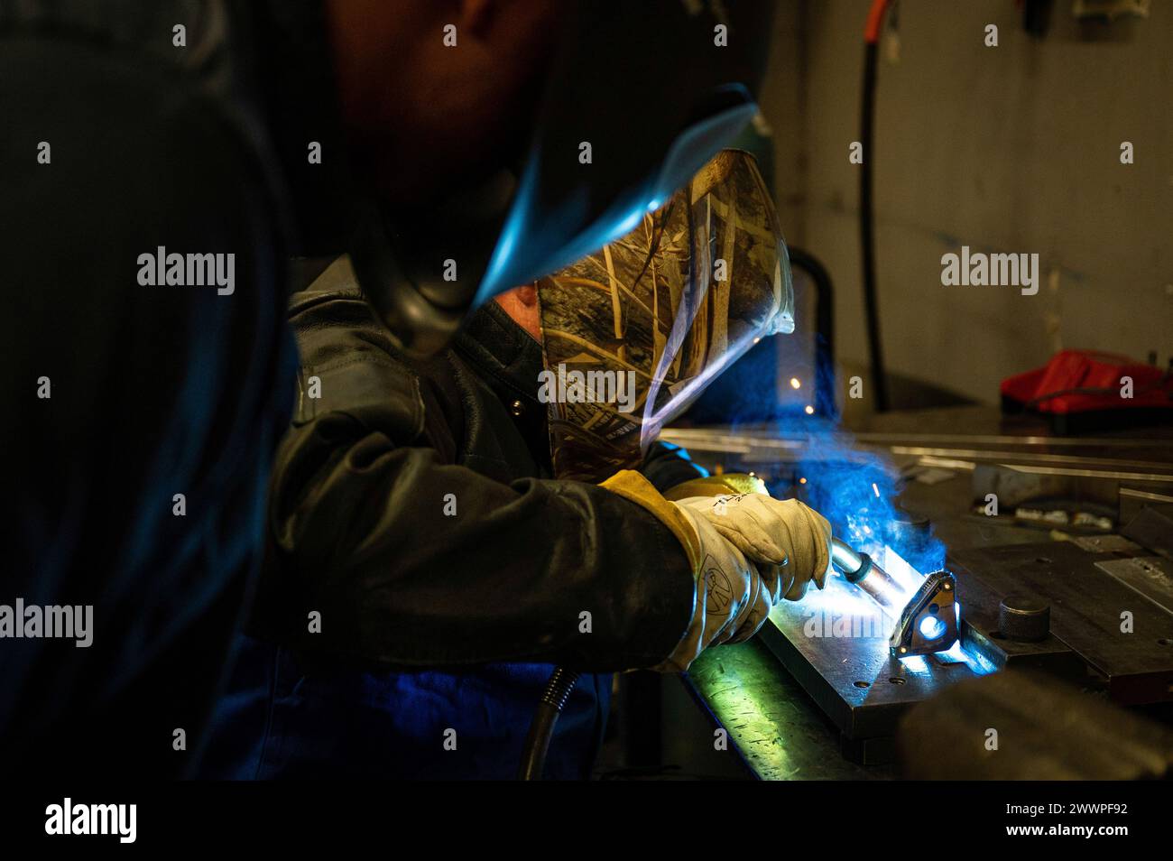 Chief Master Sgt. Justin Apticar (center), 19th Air Force command chief ...