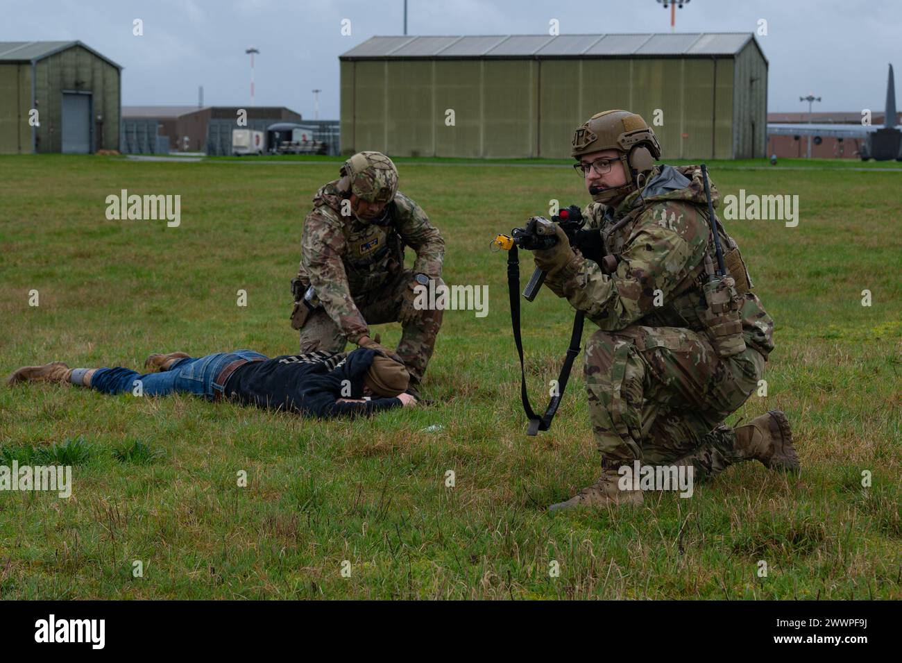 U.S. Air Force Master Sgt. Gerardo Hernandez, left, 100th Security ...