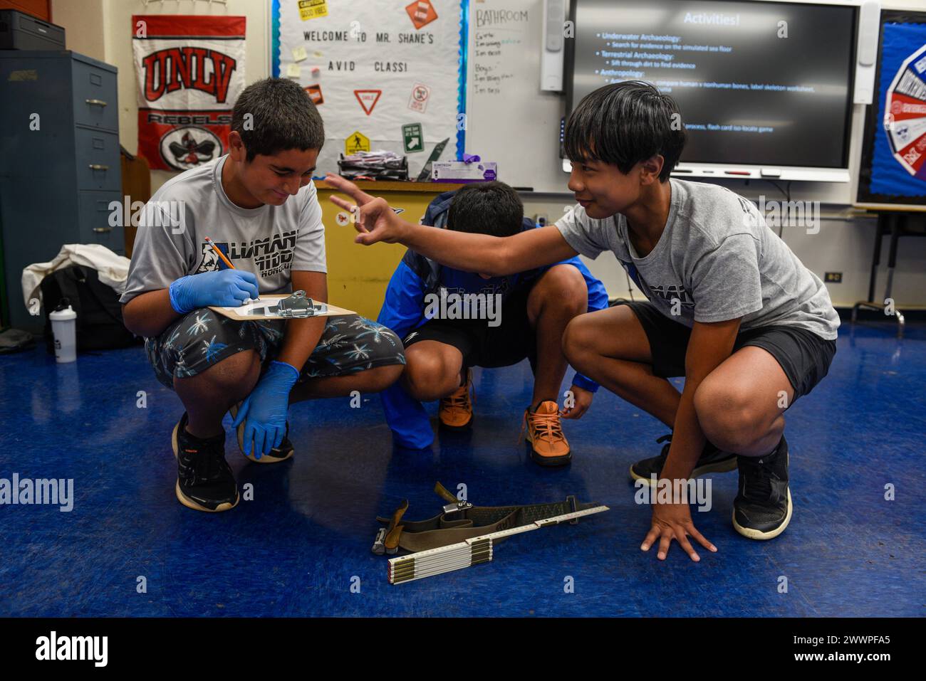Students at Aliamanu Middle School participate in a simulated ...