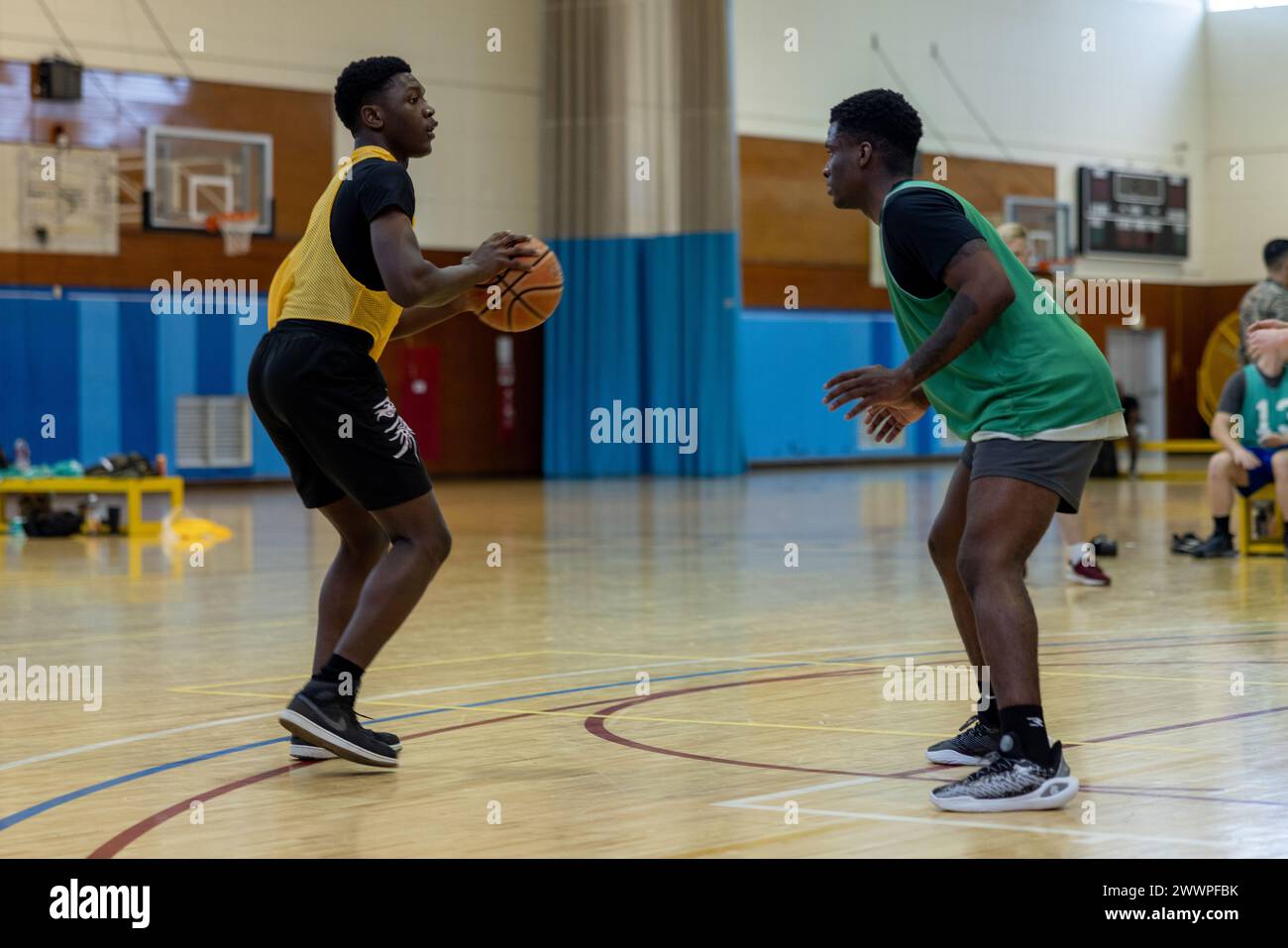 U.S. Marines with Marine Air Control Group (MACG) 18, play basketball ...
