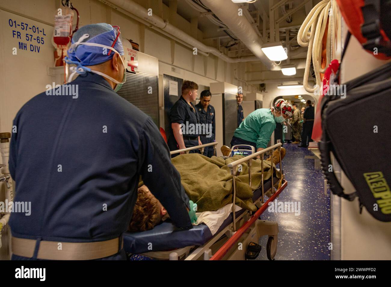 U.S. Navy medical personnel with the amphibious assault ship USS ...