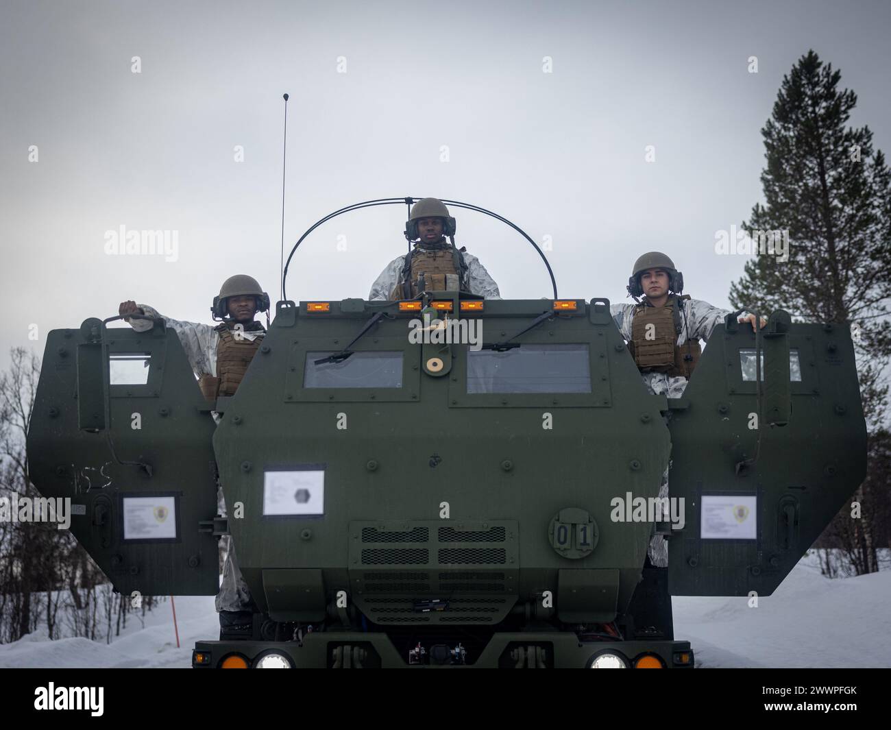 U.S. Marine Corps Cpl. Danjuma Robinson, left, a native of Florida and ...