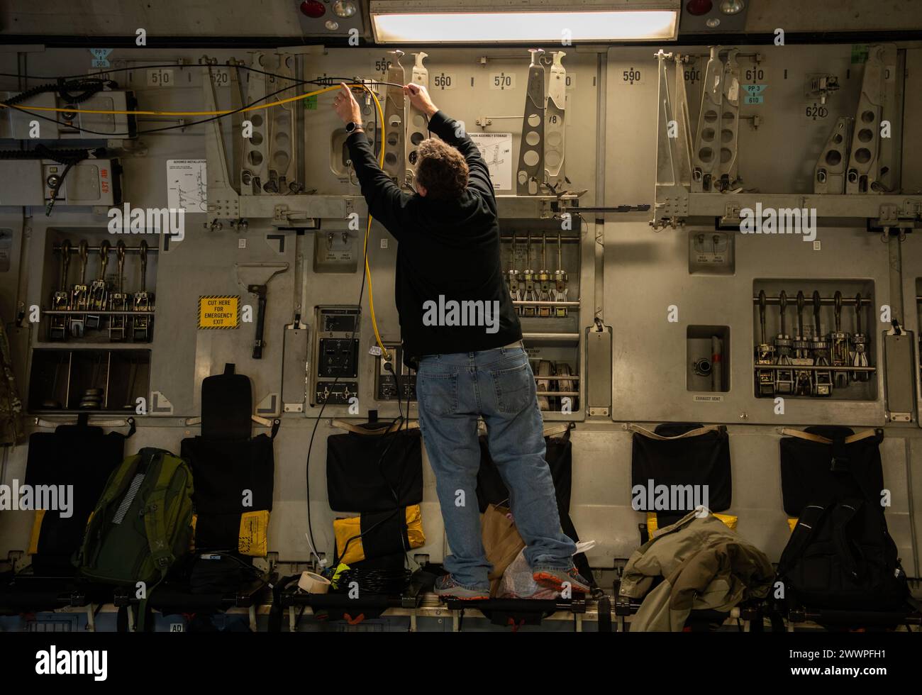 Mr. Eric Shoup, SandboxAQ software engineer, sets up a quantum sensor ...