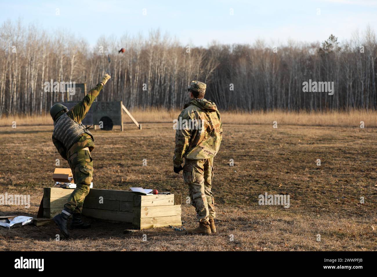 The Norwegian Home Defense Youth throw simulated hand grenades at Camp ...