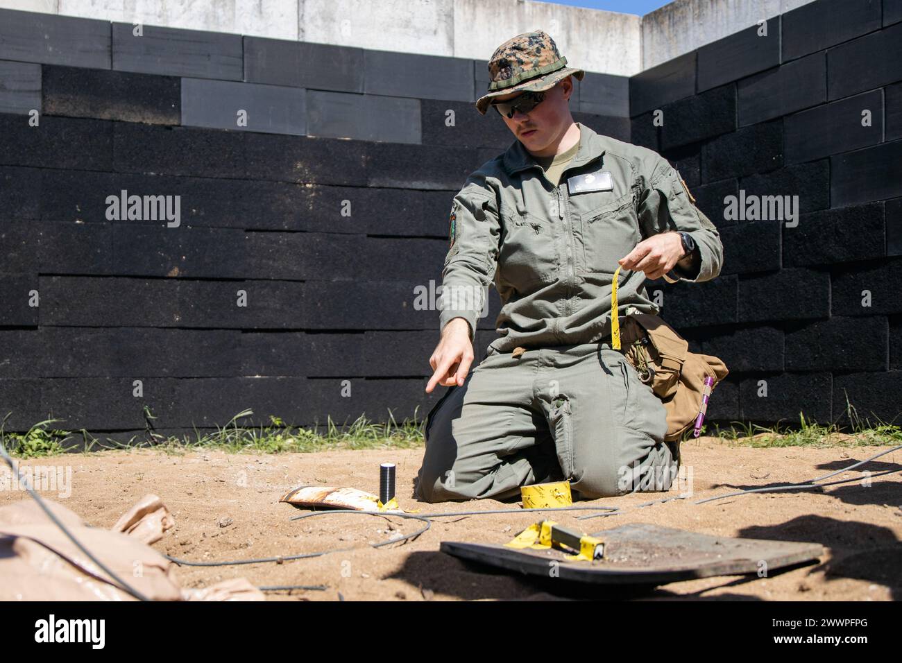 U.S. Marine Corps Sgt. Ian Heuer, an explosive ordnance disposal (EOD ...