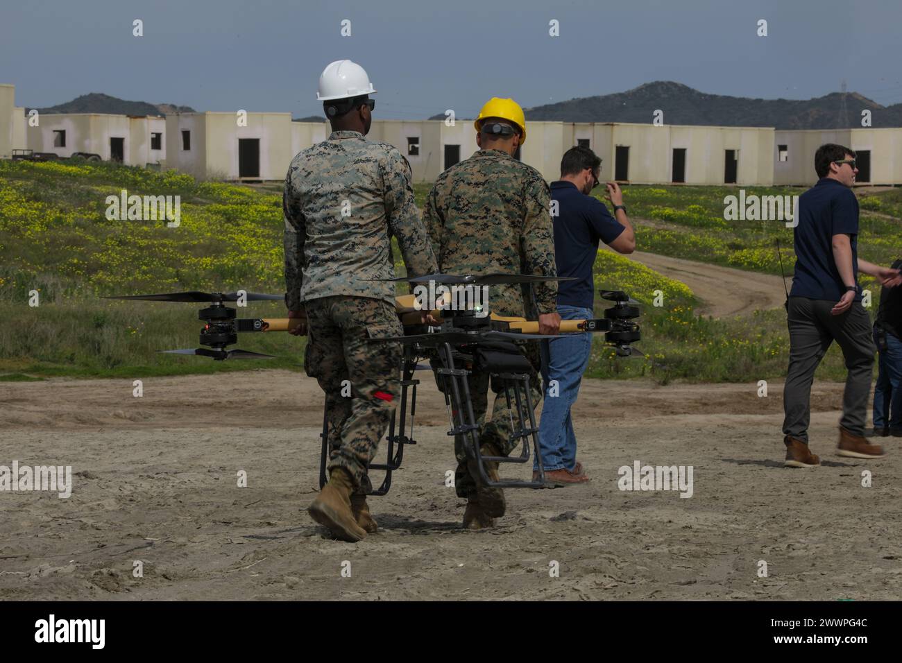 U.S. Marines and civilian members with the U.S. Marine Corps ...