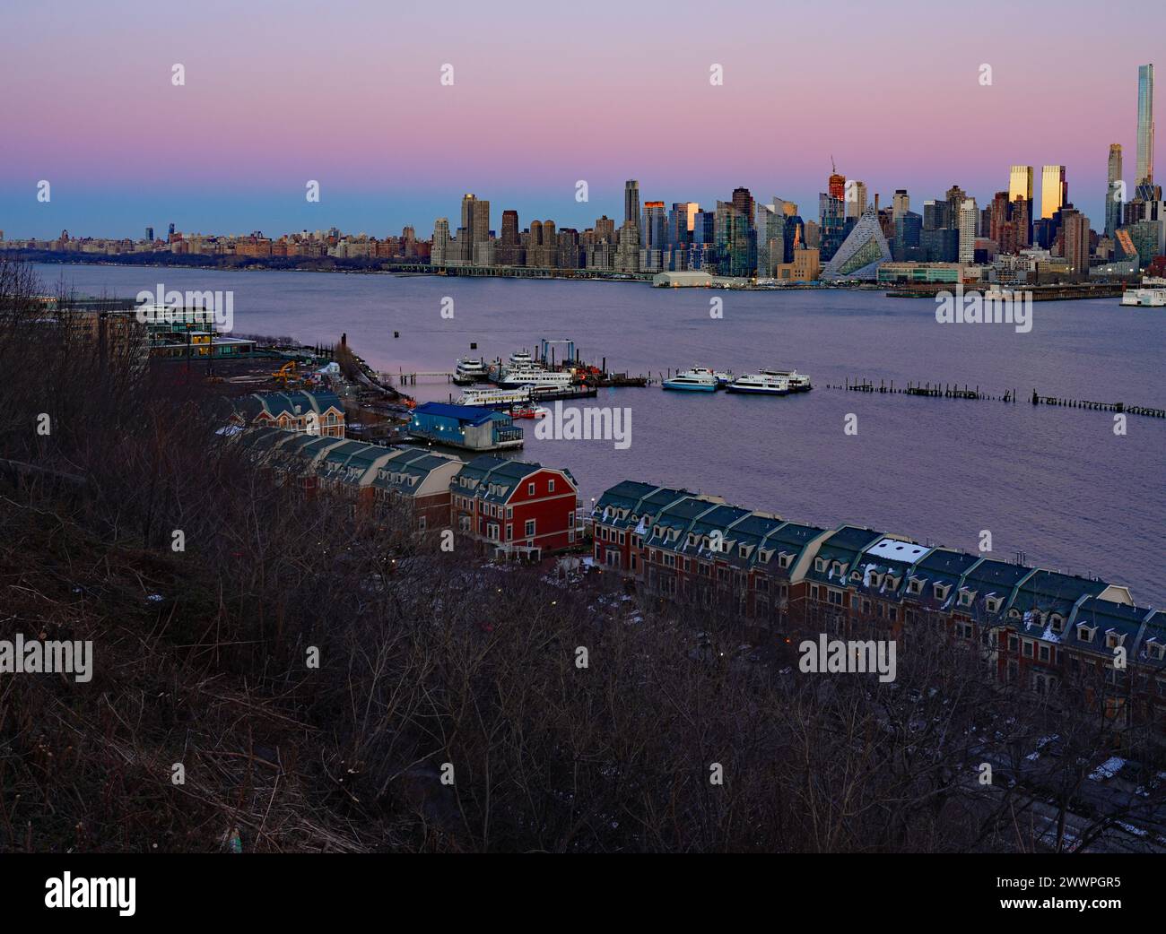 WEEHAWKEN, NJ -18 FEB 2024- Sunset view of the waterfront skyline in ...