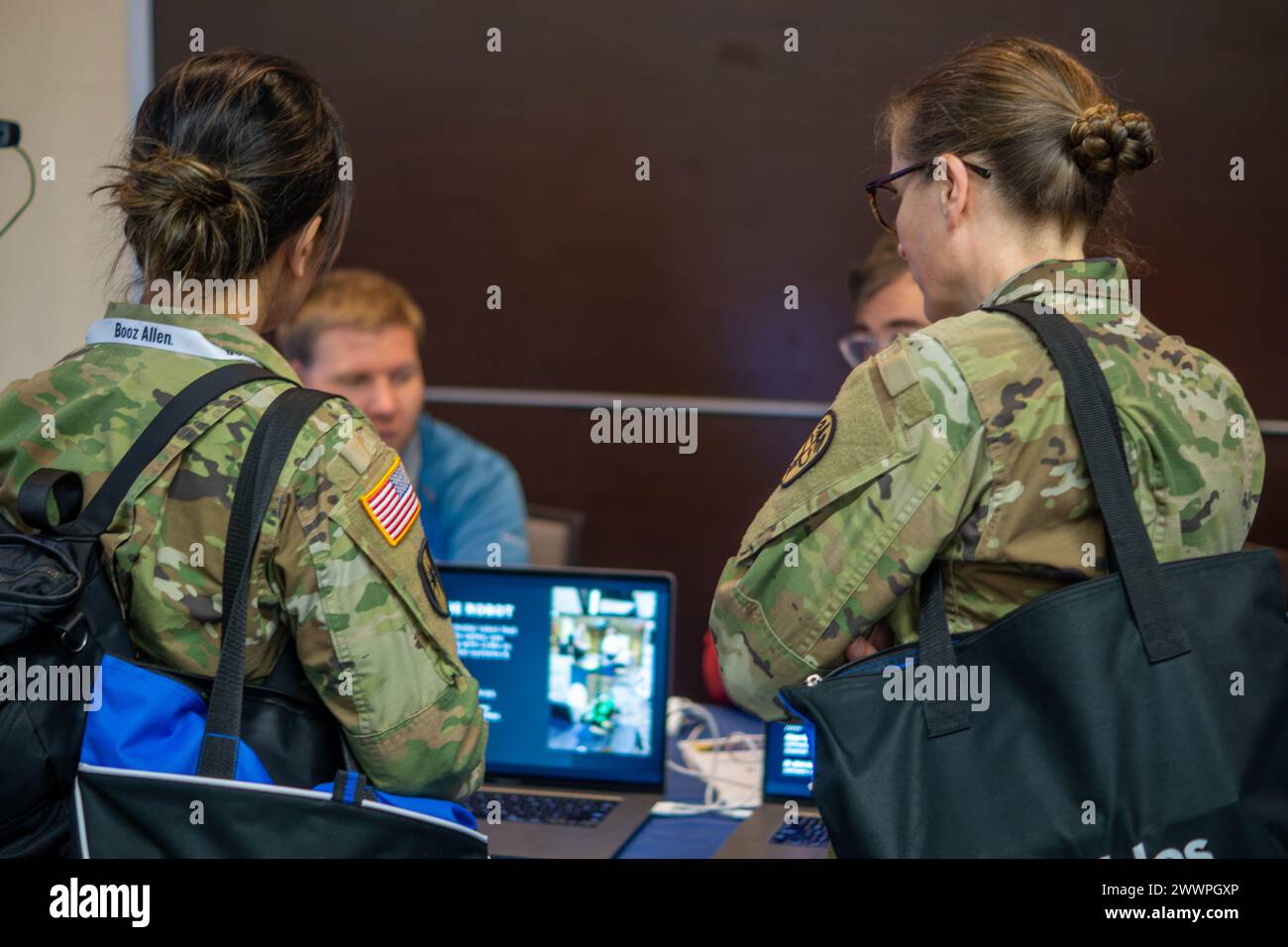 Attendees Peruse Exhibit Area Stock Photo - Alamy