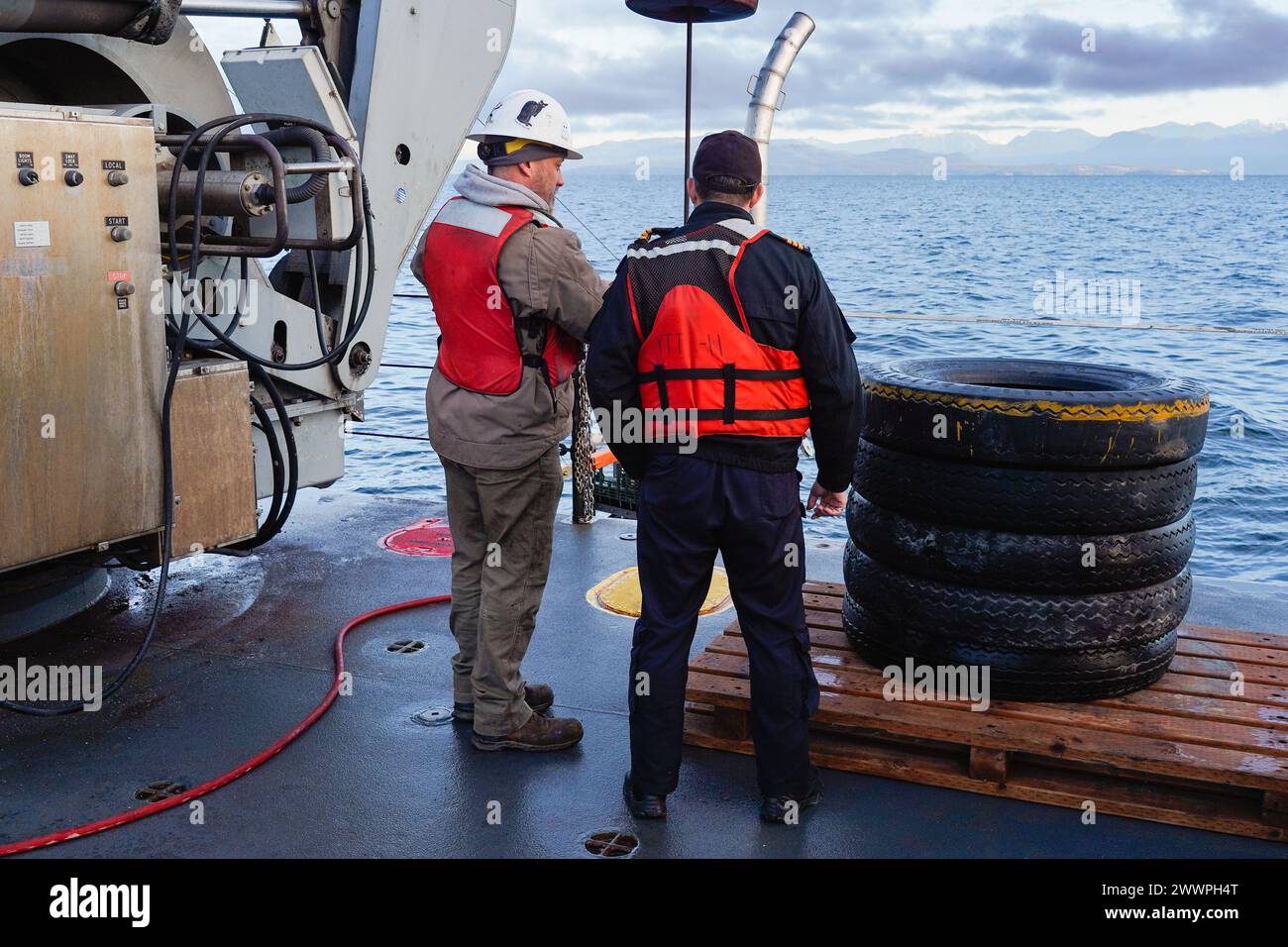NUWC Division, Keyport Engineering Technician Dirk Schmitz with Cmdr ...