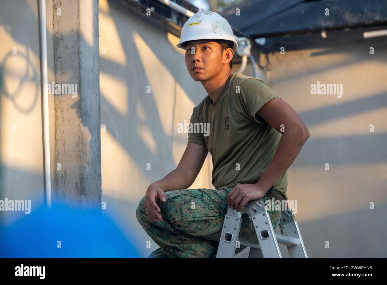 A member of 30th Battalion, Singapore Combat Engineers observes ...