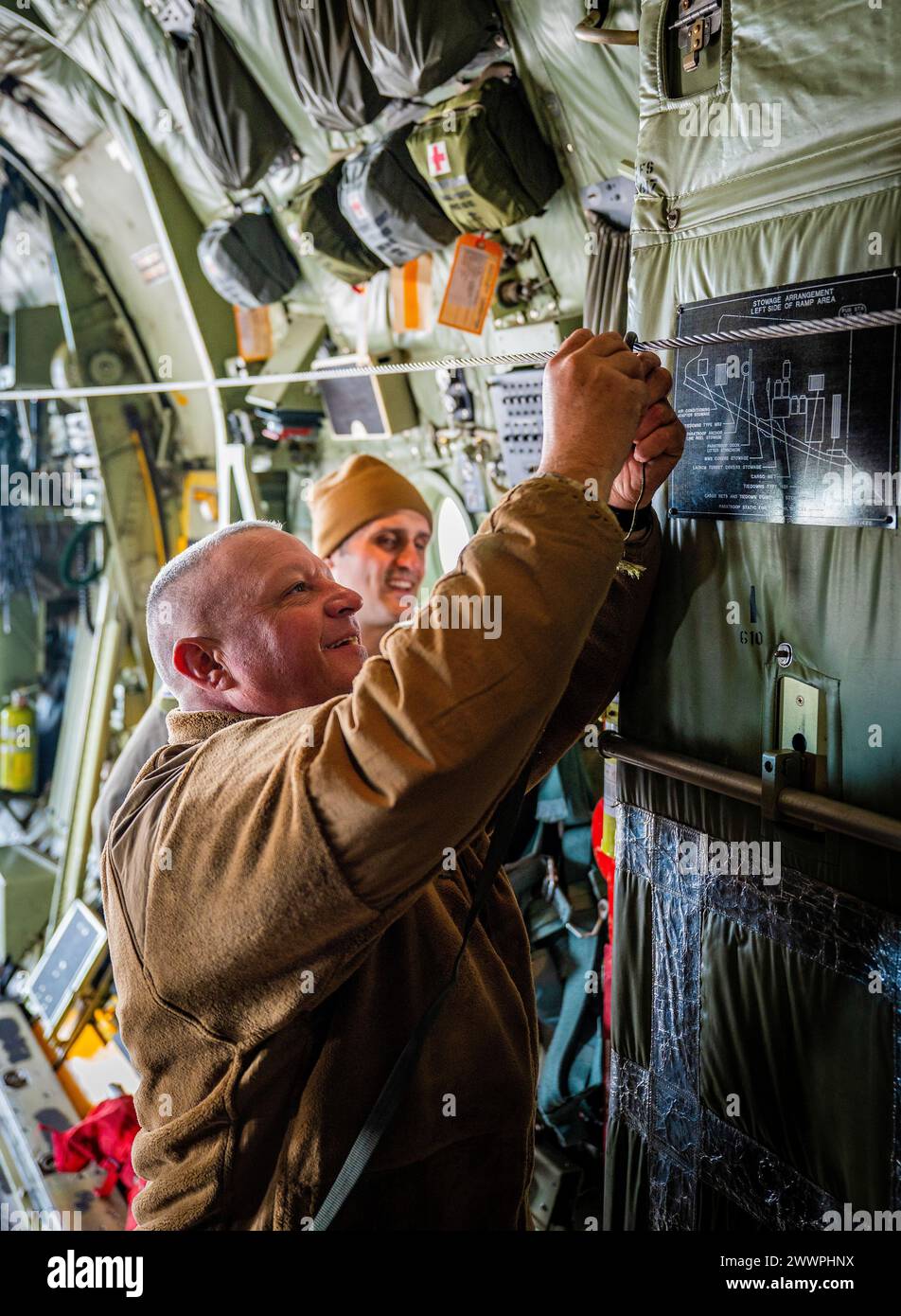 Chief Master Sgt. Justin Apticar (front), 19th Air Force command chief ...