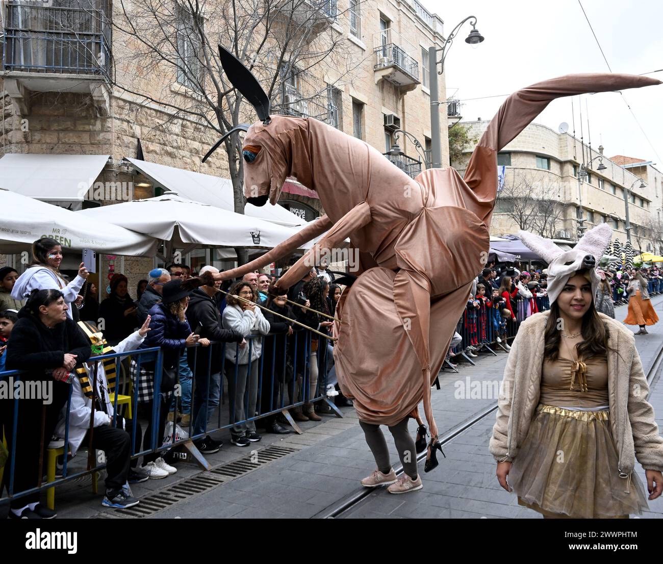 Jerusalem, Israel. 25th Mar, 2024. People wear costumes at the first ...