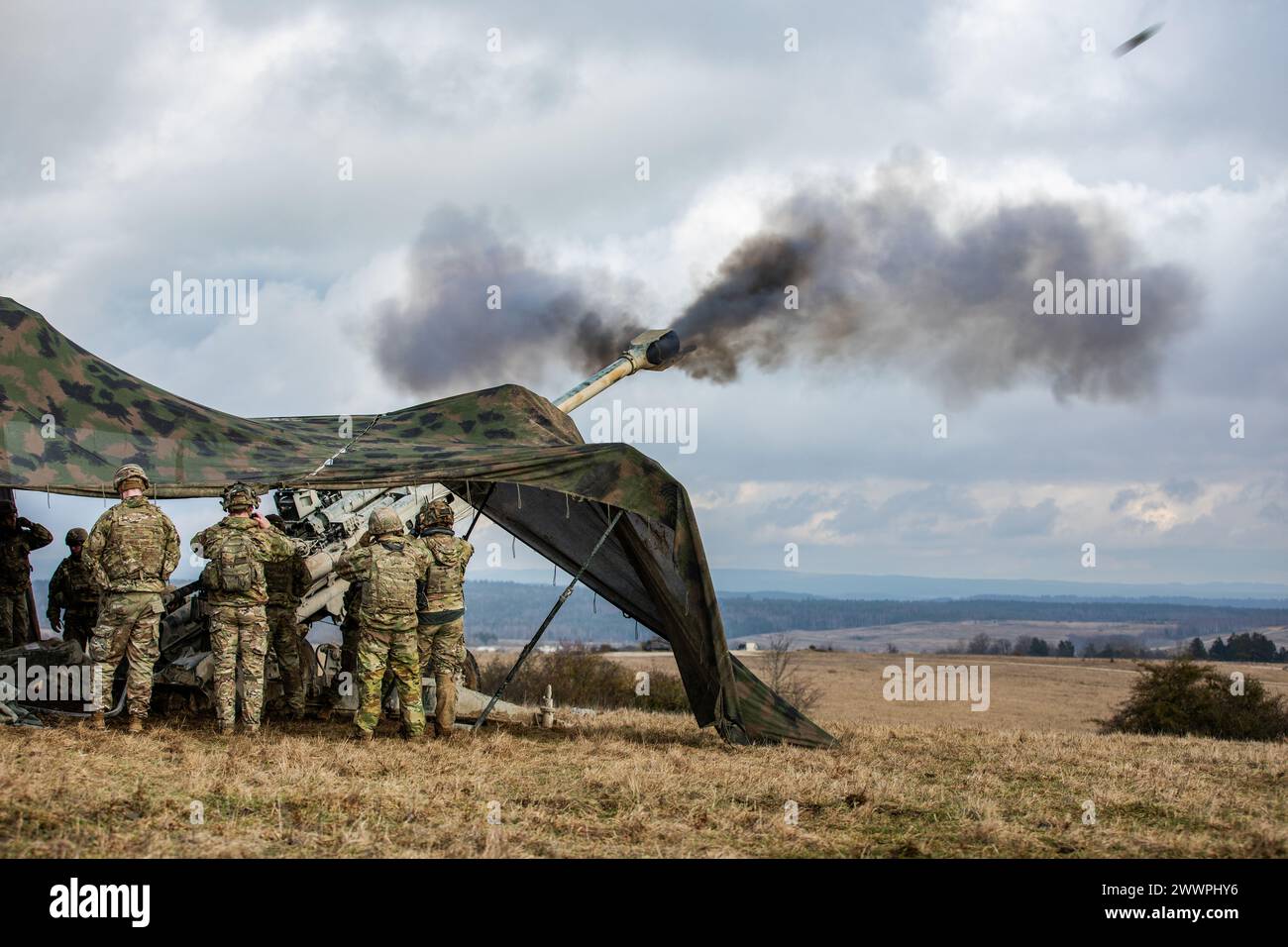 U.S. Soldiers, assigned to the 2nd Cavalry Regiment, 3rd Squadron, fire ...