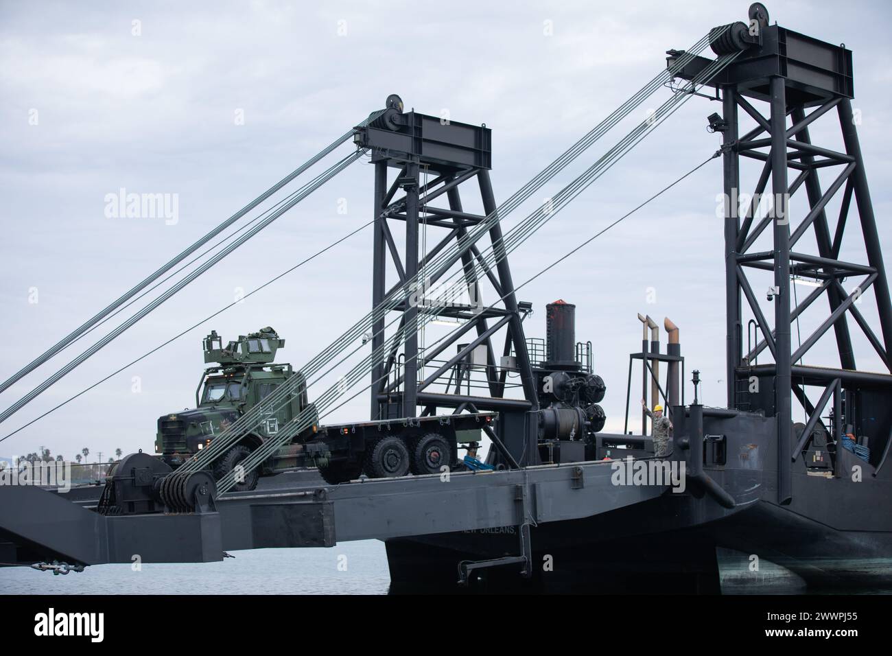 A Medium Tactical Vehicle Replacement reverses onto the HOS Resolution ...